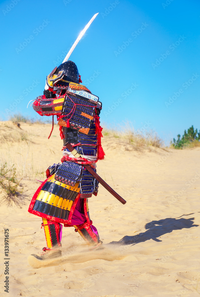 Men in samurai armour with sword running on sand Stock Photo | Adobe Stock