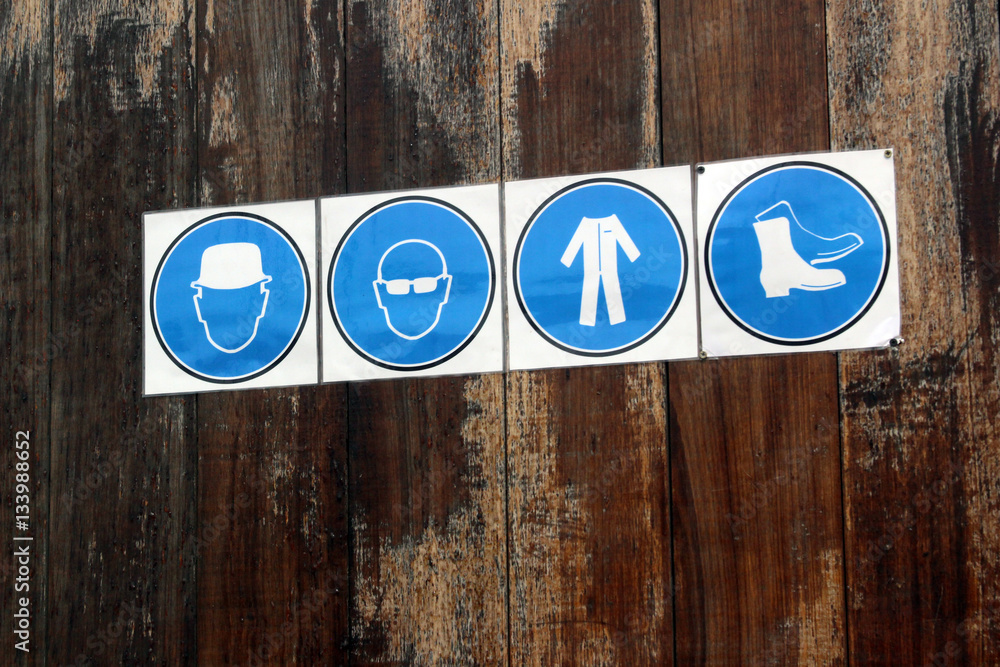 Warning signs prescribing to wear uniform on the facility territory ...