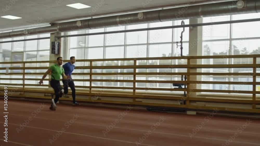 Slow motion shot of professional athlete with two whole legs competing ...