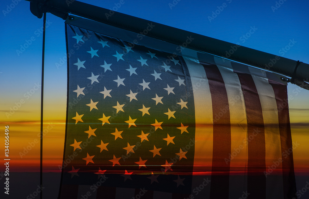 American Flag during an amazing soft sunset at the beach in America ...