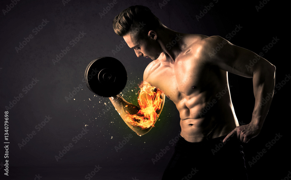 Bodybuilder athlete lifting weight with fire explode arm concept Stock ...