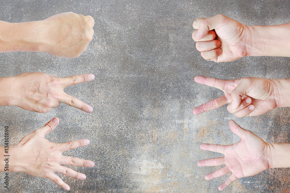 Many hands of Rock ,Paper ,Scissors - hands on blackboard background ...