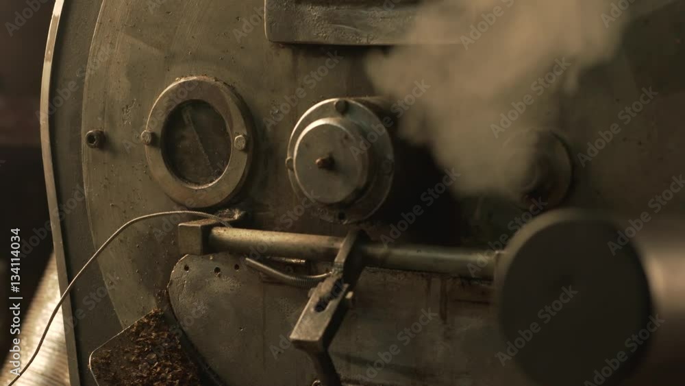 Professional roaster operating roasting machine Stock Video | Adobe Stock