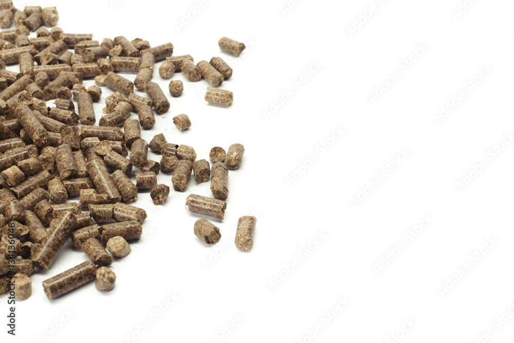 stack of wooden pellets for bio energy, white background, isolated ...