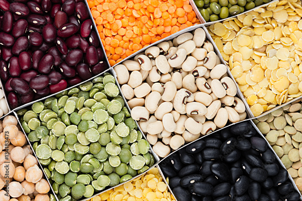 Pulses food background, assortment - legume, kidney beans, peas ...
