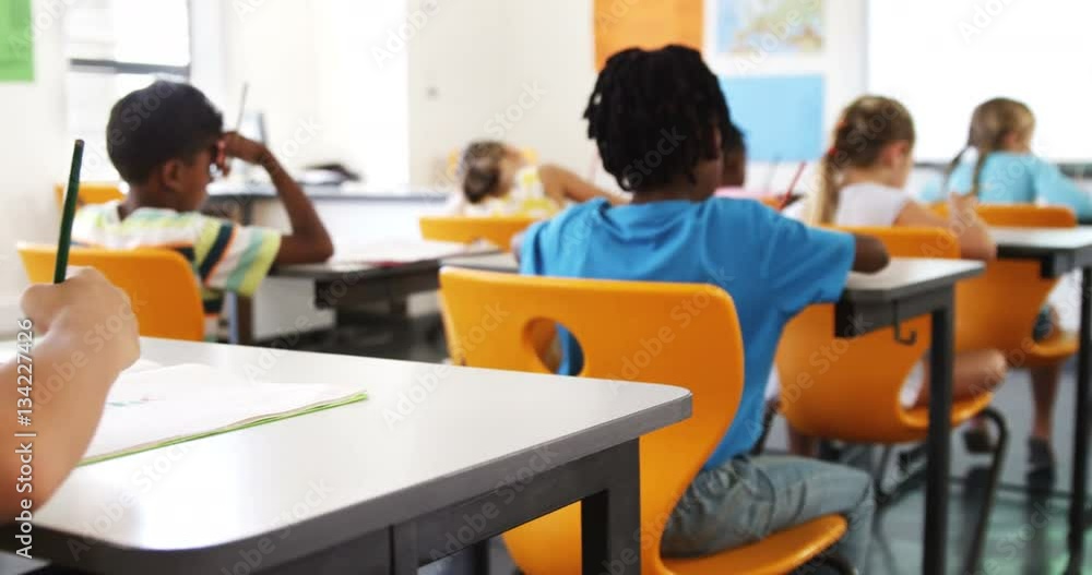 School kids studying in classroom Stock Video | Adobe Stock