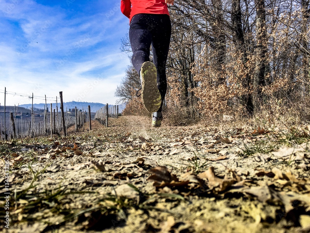 Man running on a trail in autumn Stock Photo | Adobe Stock