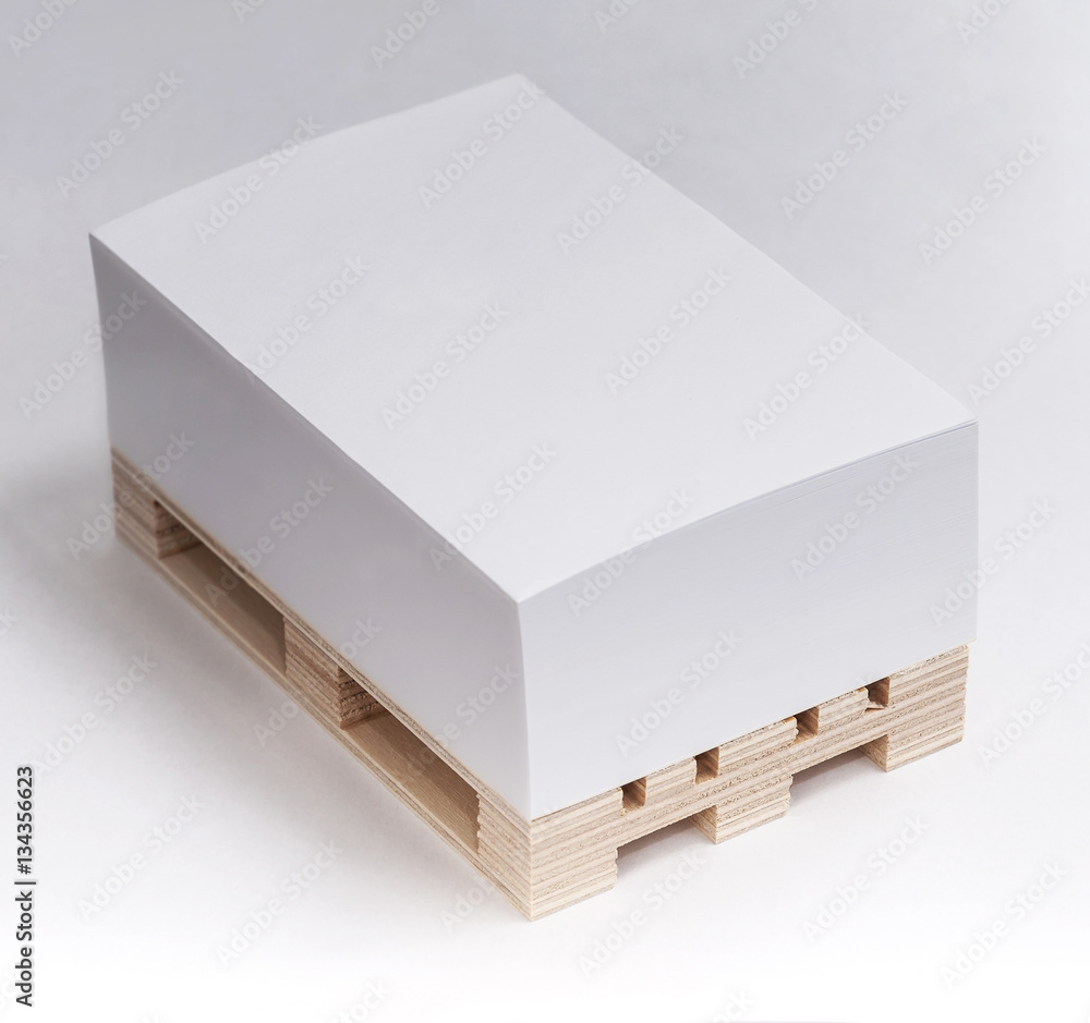 Small palet loaded with paper Stock Photo | Adobe Stock