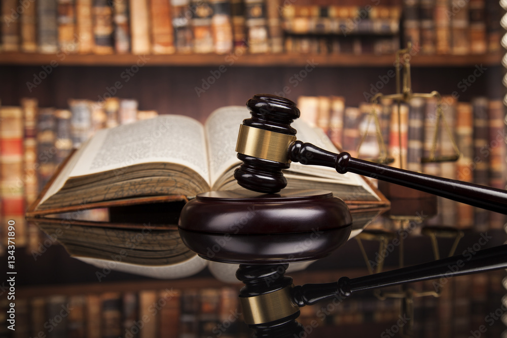 Law books, mallet of the judge, Courtroom background Stock Photo ...