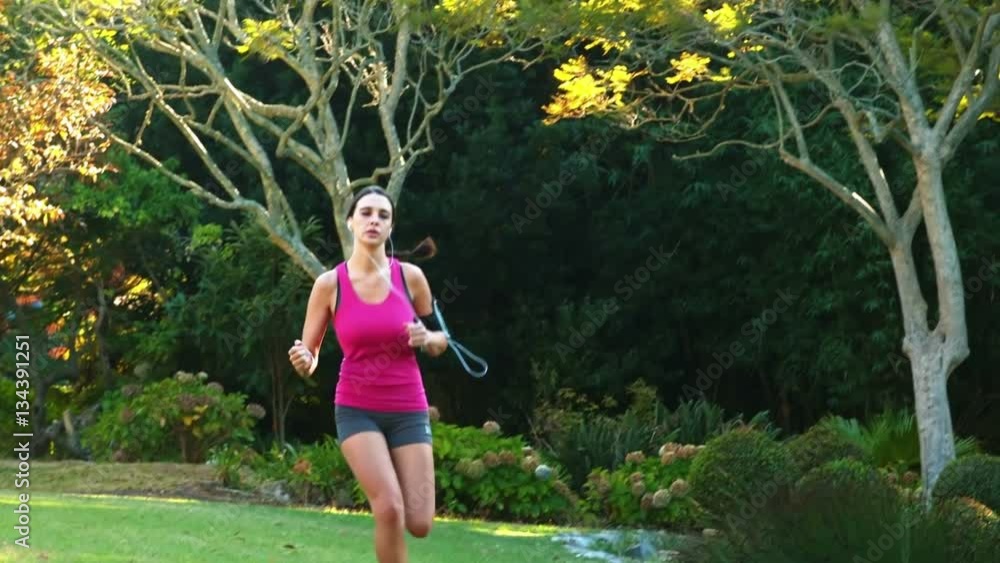 Beautiful woman jogging Stock Video | Adobe Stock