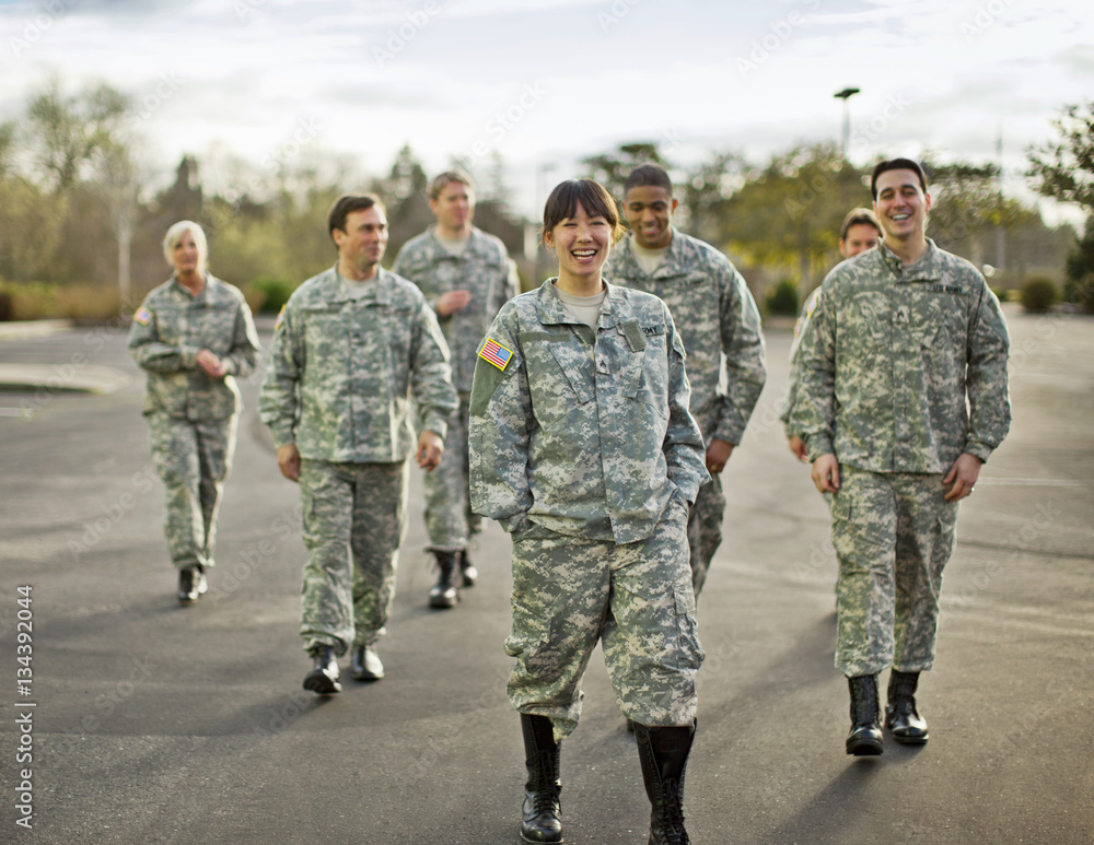 Group of US smiling army soldiers walking outdoors Stock Photo | Adobe ...