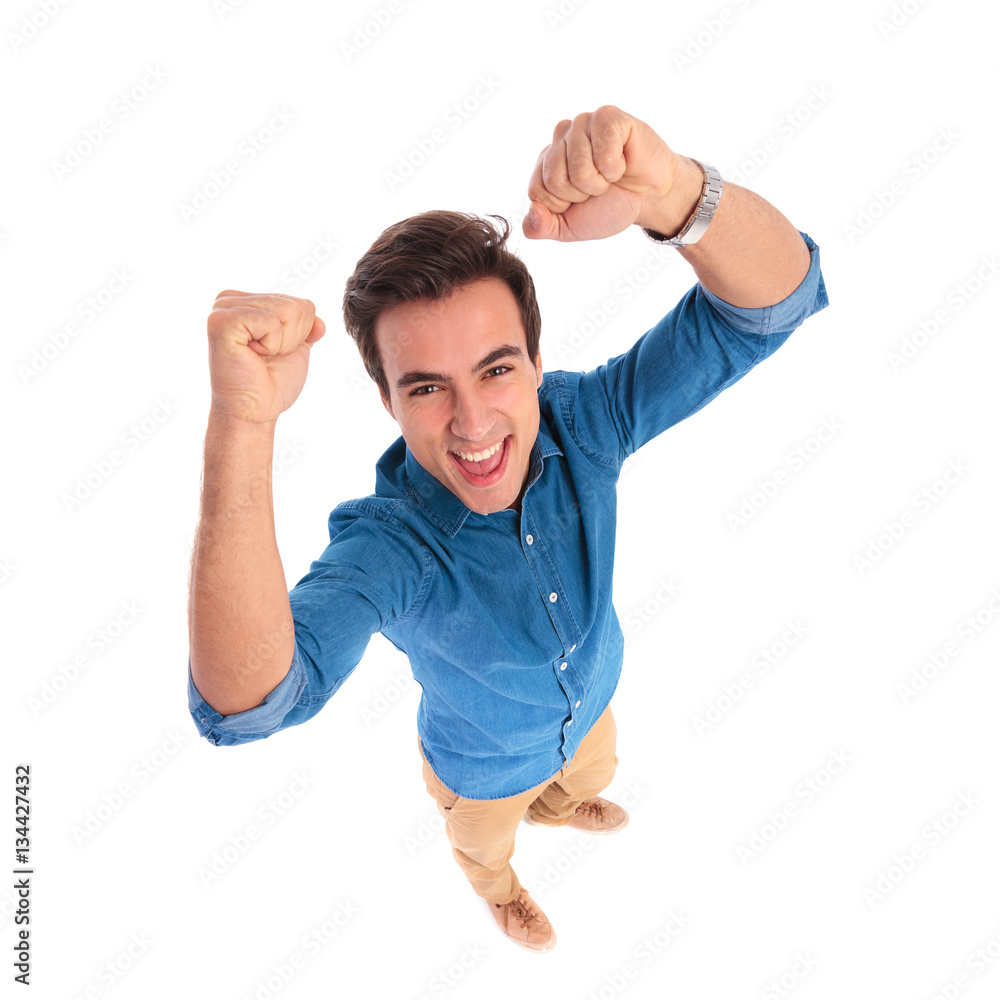 wide angle picture of a young man winning Stock Photo | Adobe Stock