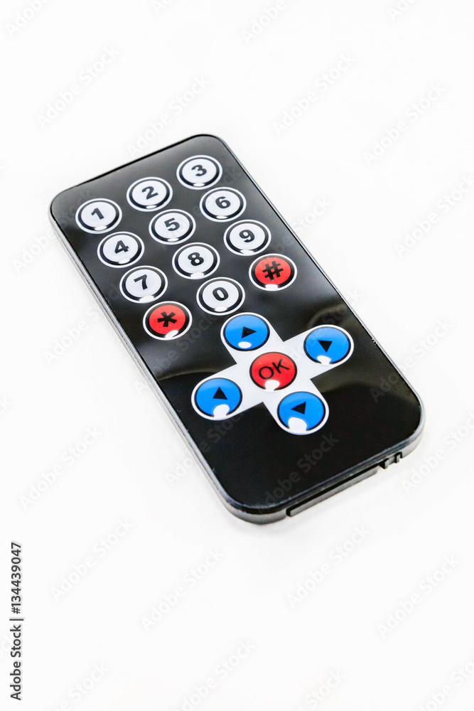 Small black remote controller on white background Stock Photo | Adobe Stock
