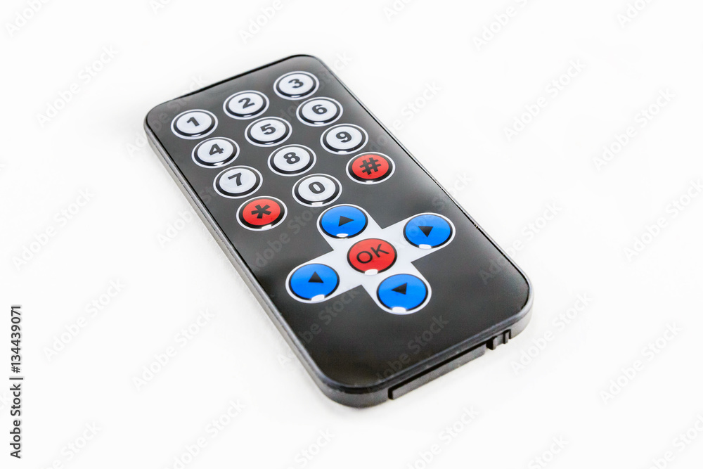Small black remote controller on white background Stock Photo | Adobe Stock