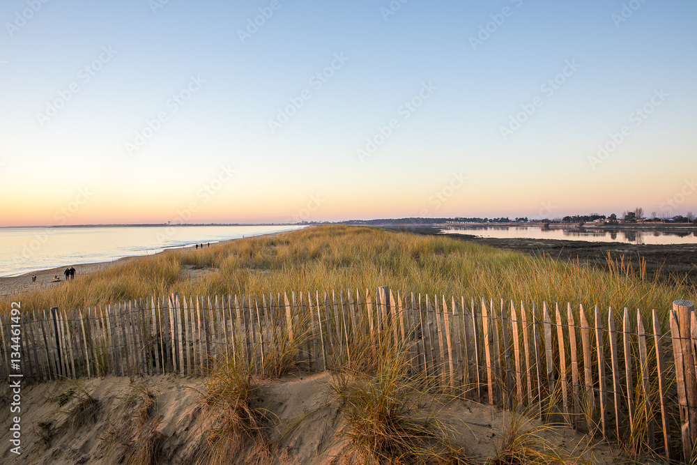 View Of Sunset Over Beach Of L Aiguillon Sur Mer And The Lagoon Of View Of Sunset Over Beach Of L Aiguillon Sur Mer And The Lagoon Of
