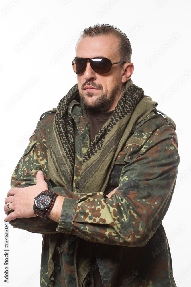 adult scary man in a camouflage jacket. a dangerous person. foto de ...