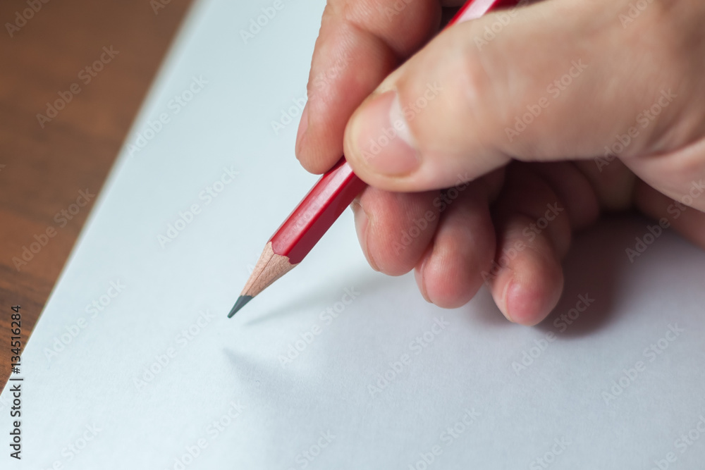 A close photo of a persons writing a letter with a pencil Stock Photo ...