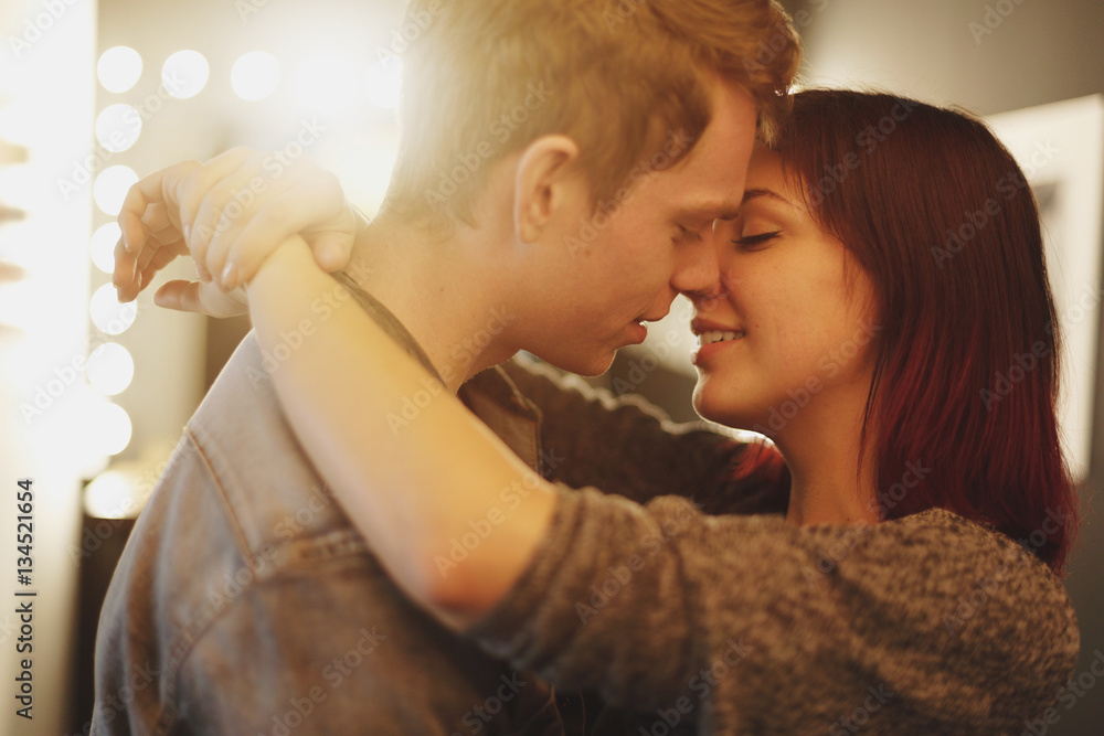 Romantic couple touching and kissing each other Stock Photo | Adobe Stock