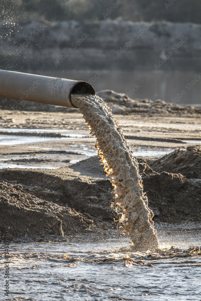 industrial effluent, pipeline discharging liquid industrial waste into ...