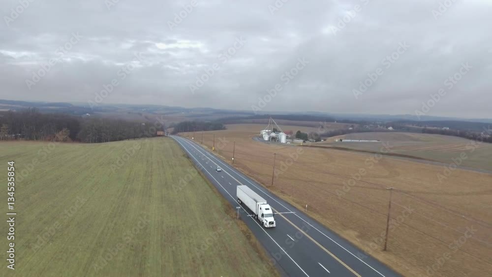 Truck driving down country road Stock Video | Adobe Stock