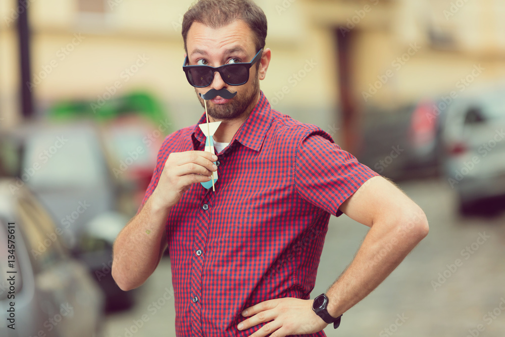 Foto de Man having fun outdoors. do Stock | Adobe Stock