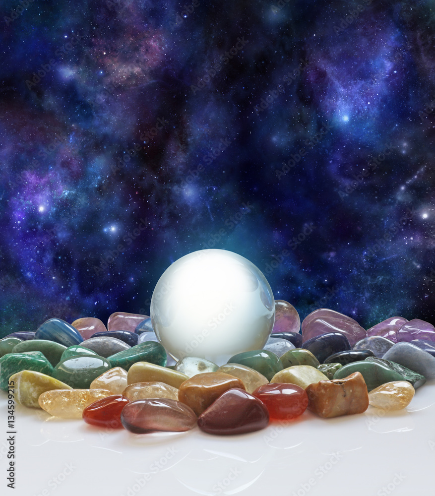 Crystal ball, healing crystals and the Universe - large clear crystal ...