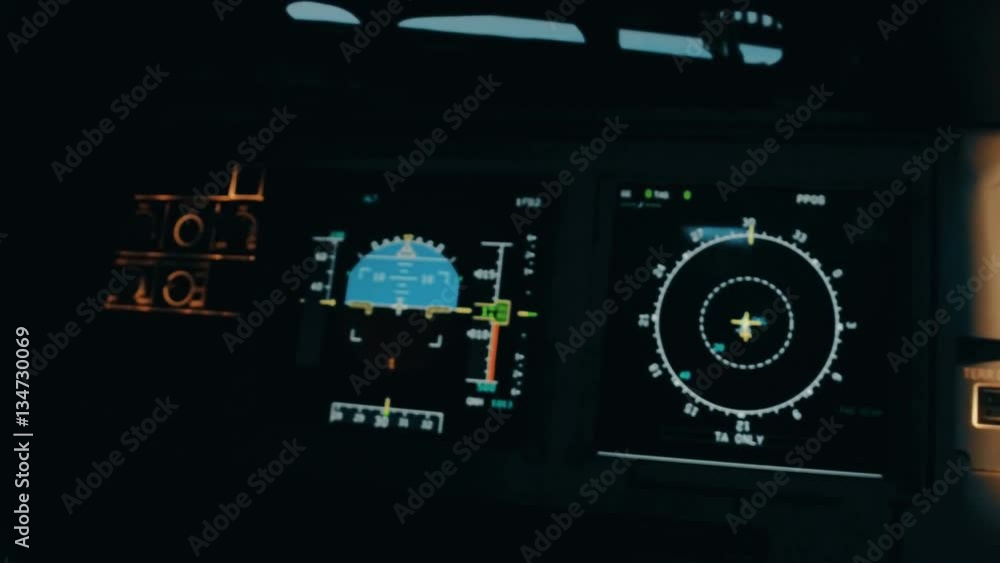 Close shot and panorama of aircraft cabin or cockpit with EFIS. Flight ...