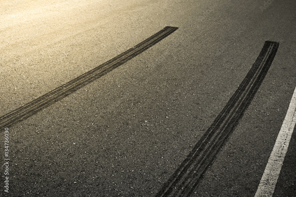 Abstract asphalt road background with crossing of tires tracks Stock ...