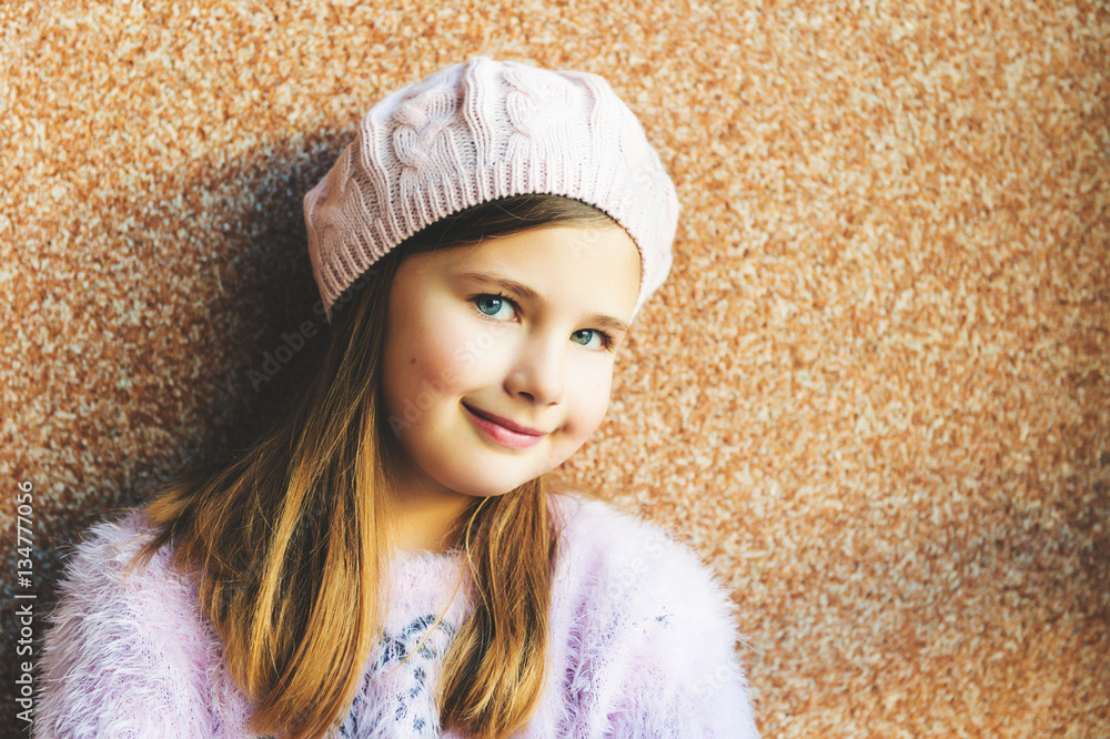 Close up portrait of cute 9 year old little girl with blue eyes ...