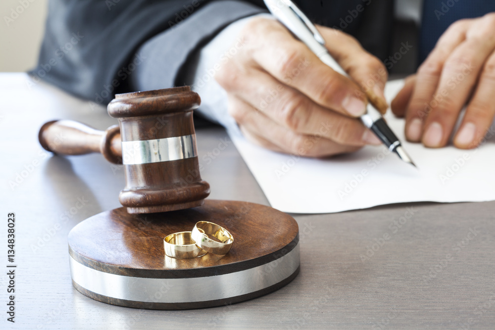Judge with gavel on table Stock Photo | Adobe Stock