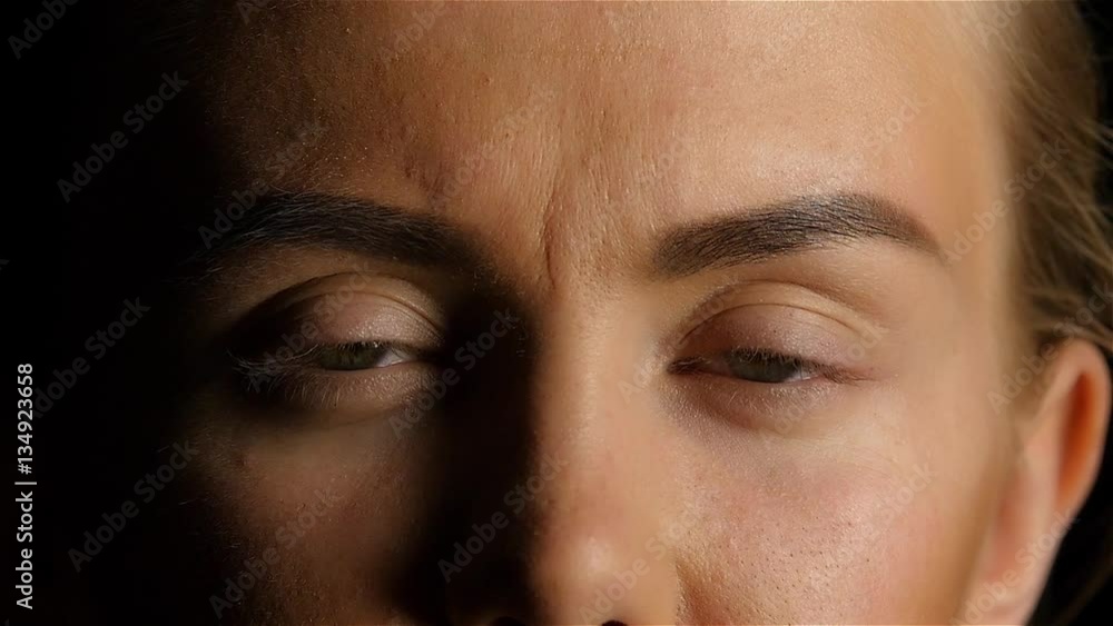 Girl with poor eyesight to wince in pain. Slow motion. Close up Stock ...