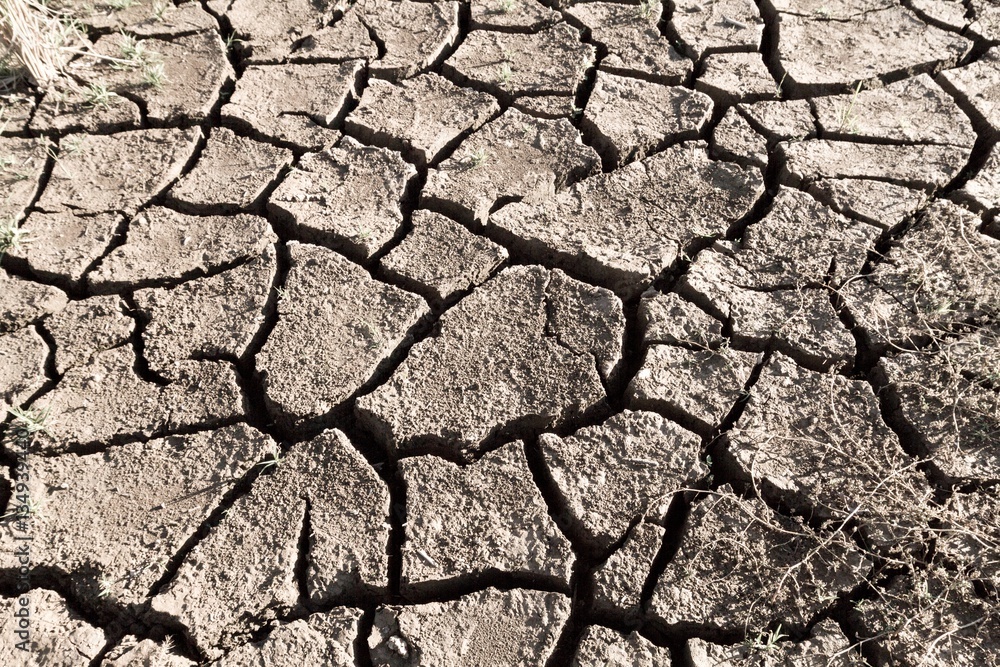 Terrible drought with dry and cracked land, arid soil, no water ...