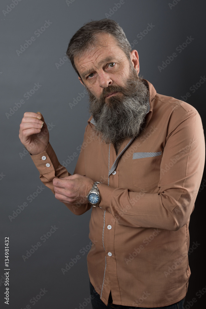 Photo of an angry grumpy old man looking very displeased. Male man with ...