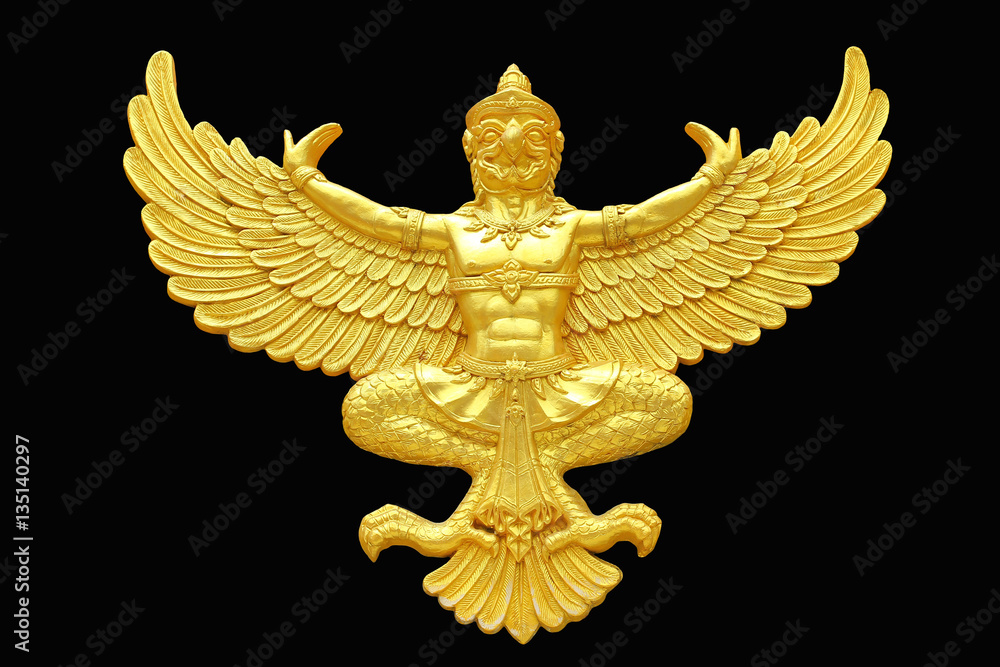 Golden garuda statue isolated on black background Stock Photo | Adobe Stock