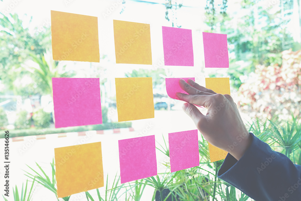 Note paper reminder schedule board. Business people meeting and use ...