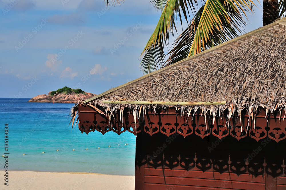 Traditional house by the sea with details in traditional carving and ...