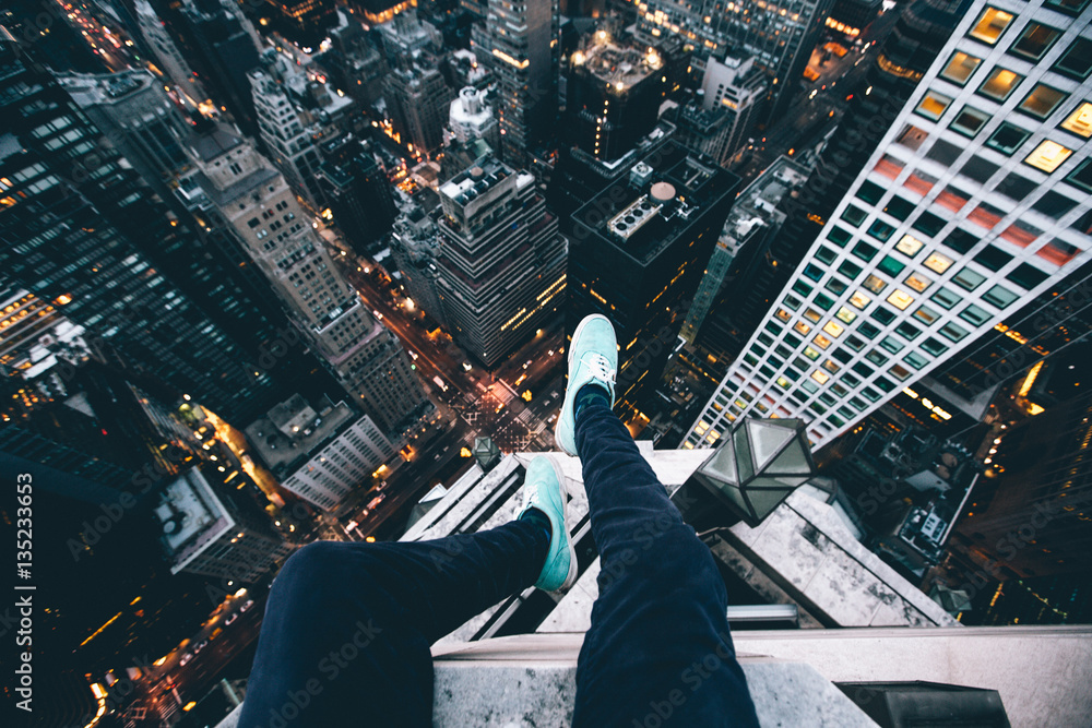 Personal perspective from top of skyscraper at dusk Stock Photo | Adobe ...