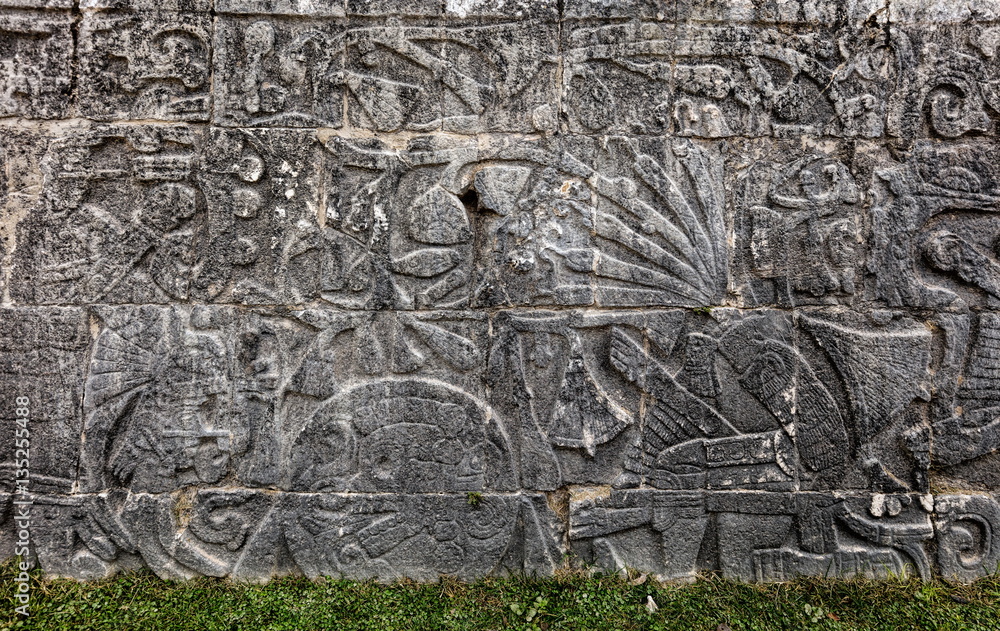 Ancient Mayan mural at the Great Ball Court in Chichen Itza depicting ...