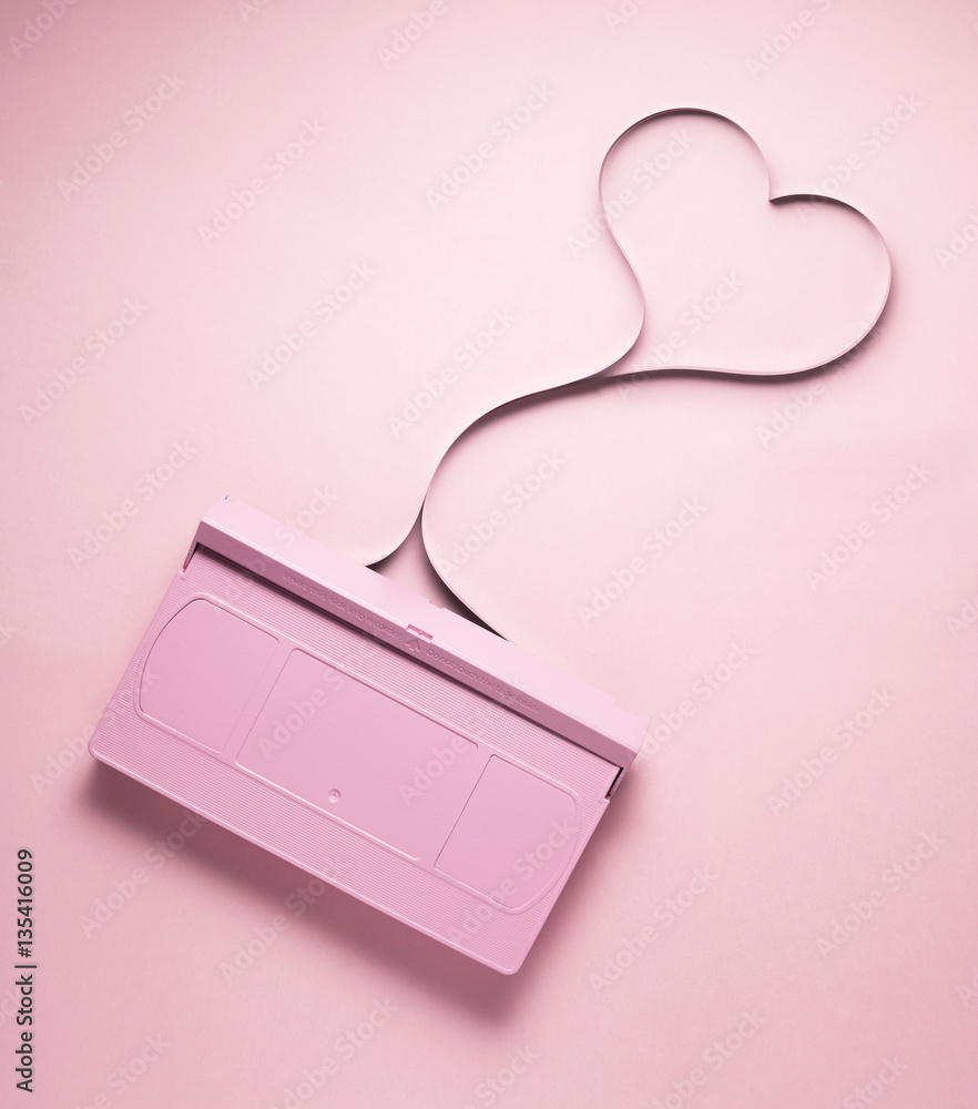 Retro love / Creative love concept photo of painted VHS cassette with ...