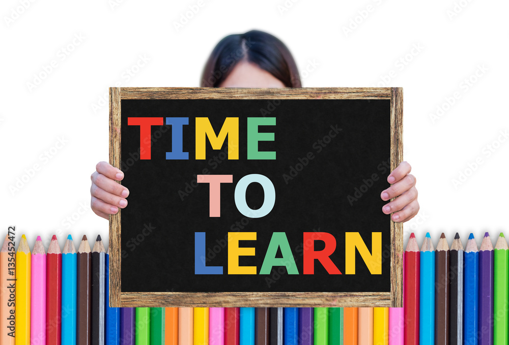 TIME TO LEARN message on the blackboard wooden frame on hand woman and ...