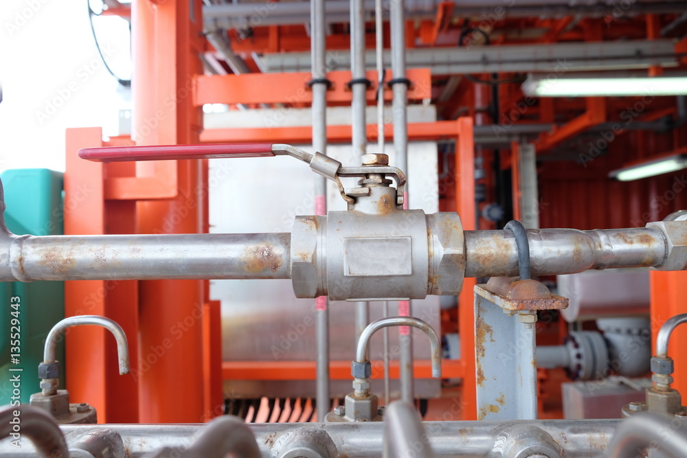 Pneumatic valve at an oil and gas industrial. Stock Photo | Adobe Stock