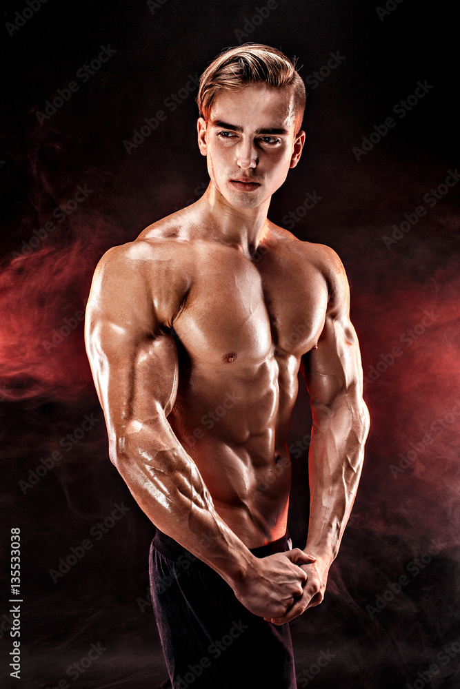 Strong Man Bodybuilder with Six Pack and perfect abs, shoulders, biceps ...