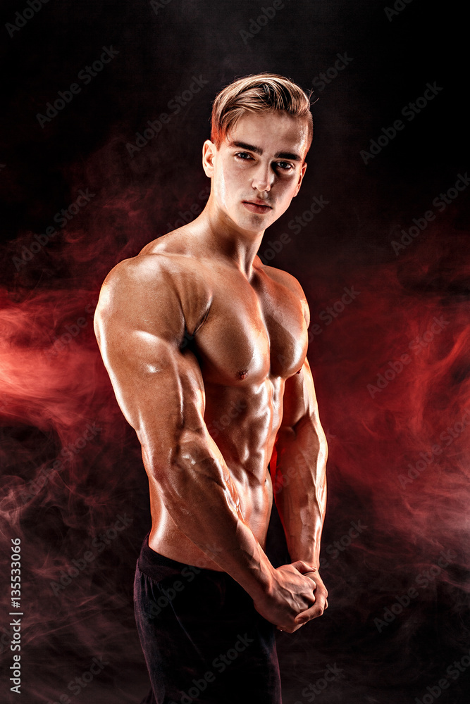 Strong Man Bodybuilder with Six Pack and perfect abs, shoulders, biceps ...