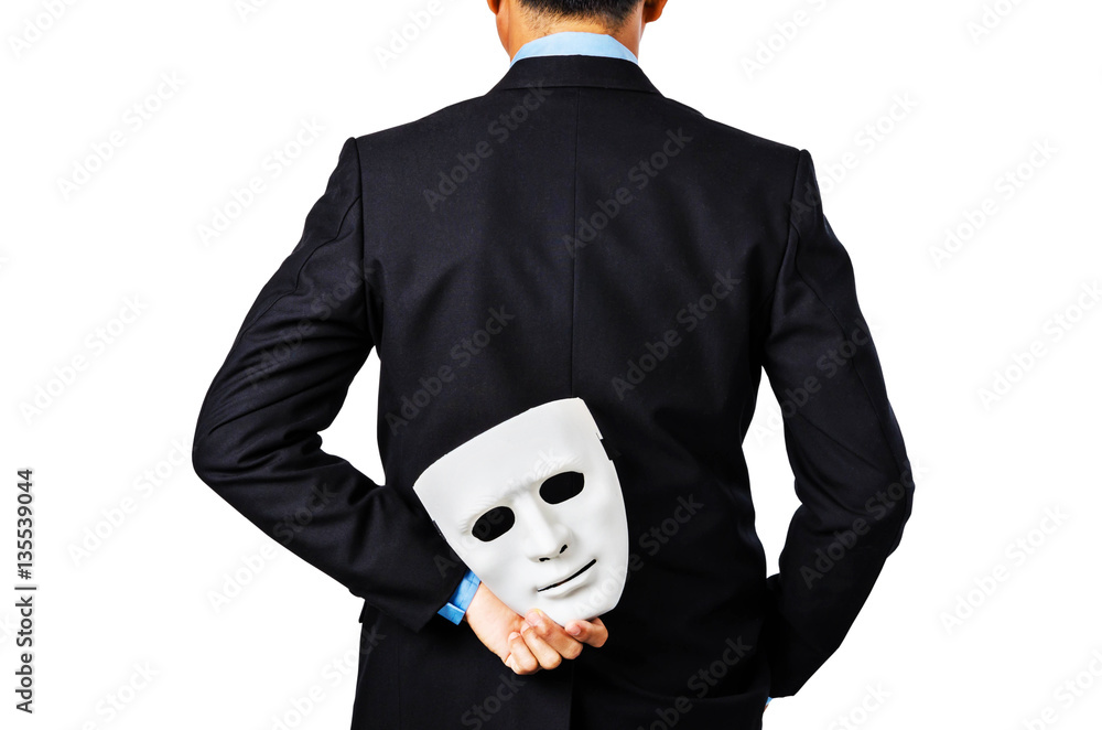 Behind of business man holding white mask. Stock Photo | Adobe Stock
