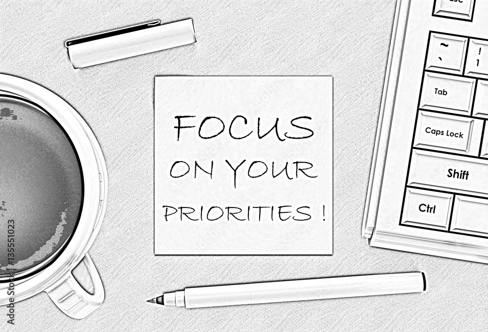 FOCUS ON YOUR PRIORITIES, message on note paper, computer and coffee on ...
