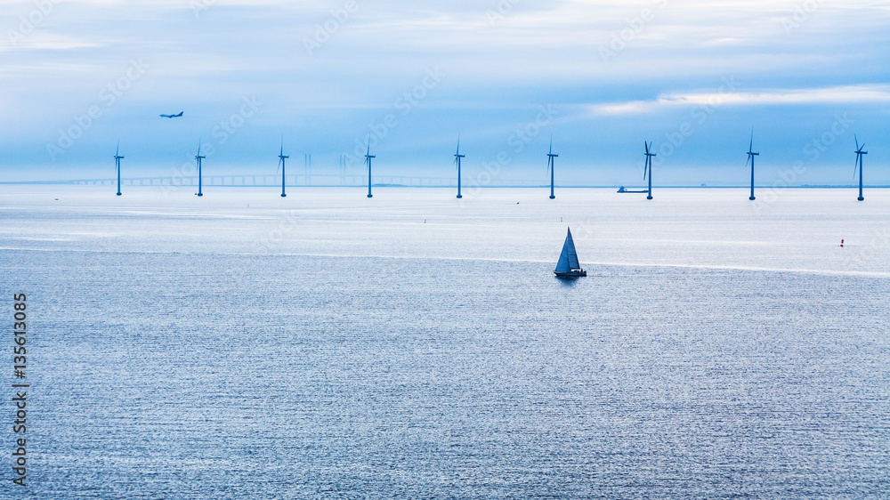 airplane, ships and bridge near offshore wind farm Stock Photo | Adobe ...