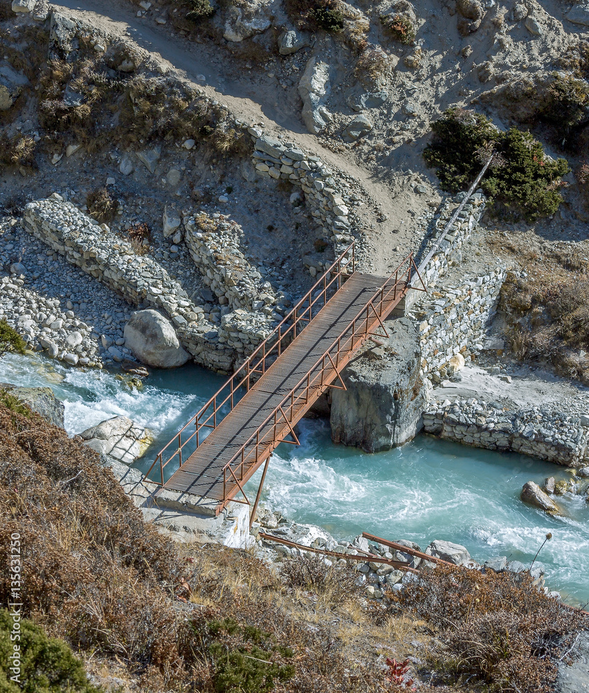 The metal bridge on the trail to Everest near Periche village - Nepal ...