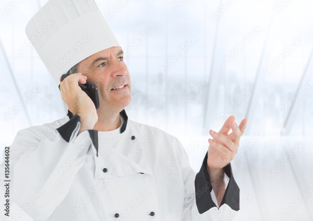 Chef talking on mobile phone Stock Photo | Adobe Stock