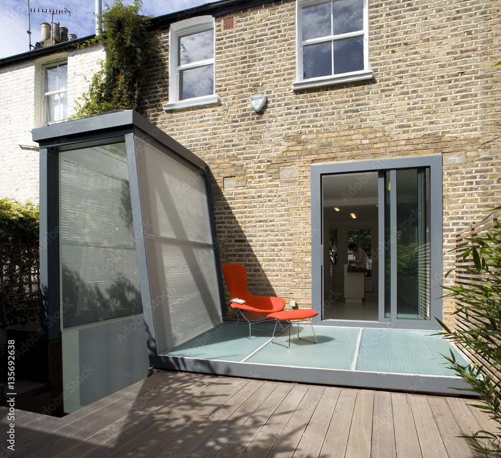 Light Refraction, London. Modern patio and decking on rear of Victorian ...