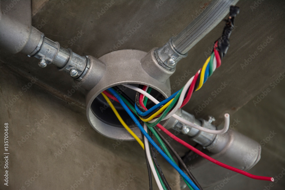 electrical cable in galvanized conduit pipe connection Stock Photo ...